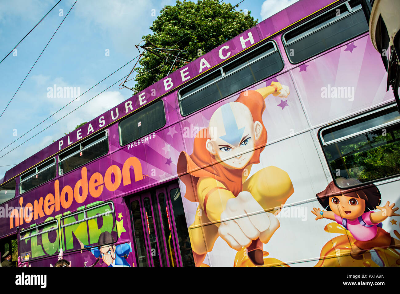Childrens cartoon artwork on a pleasure beach blackpool tram at Crich ...
