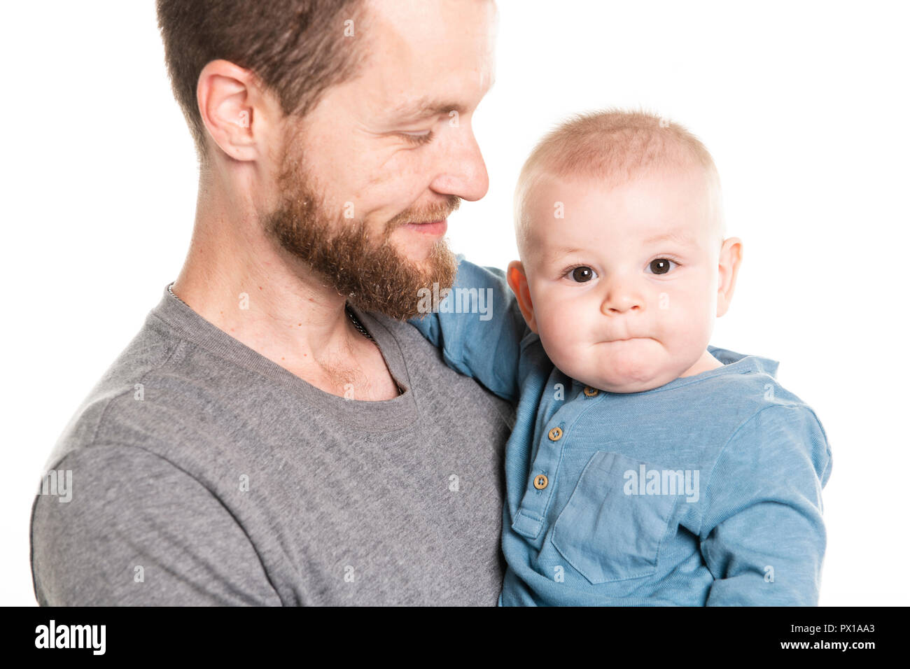 Father with cute baby on studio white background Stock Photo - Alamy