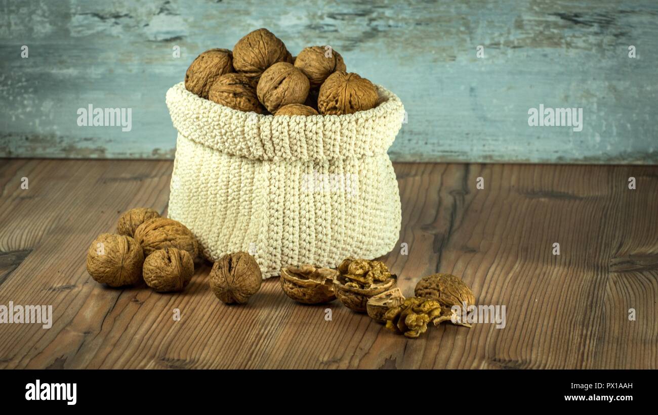 Harvest of walnuts in a sachet, Vintage and rustic style Stock Photo ...