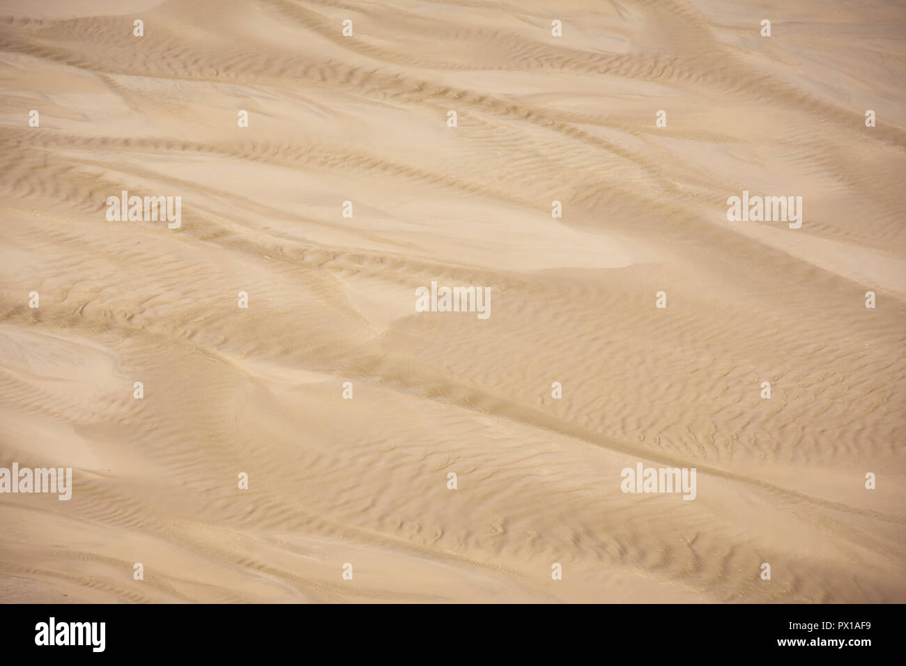 Abstract background from patterns in the sand on the beach Stock Photo ...