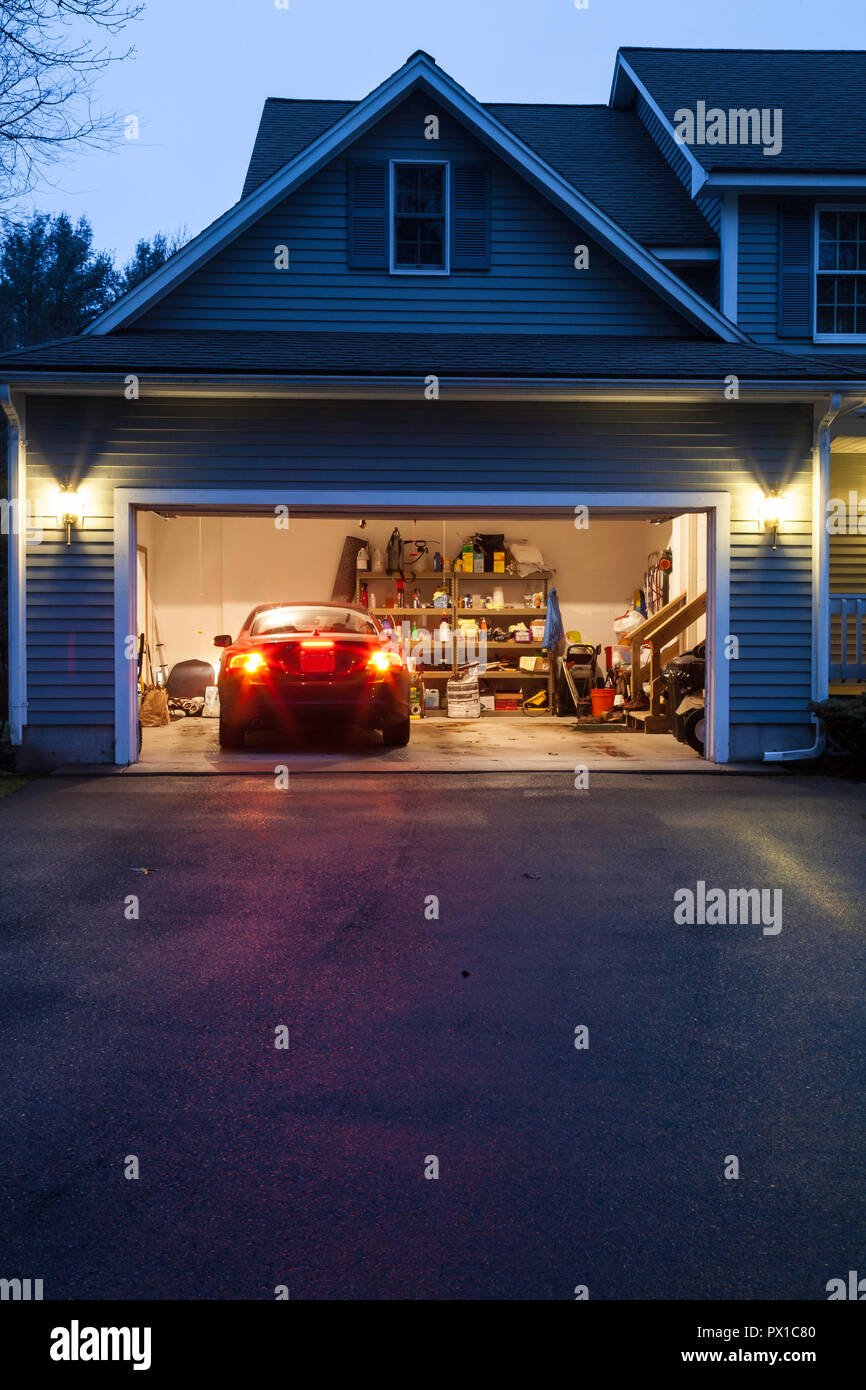 Open garage doors in a suburban home, USA Stock Photo - Alamy