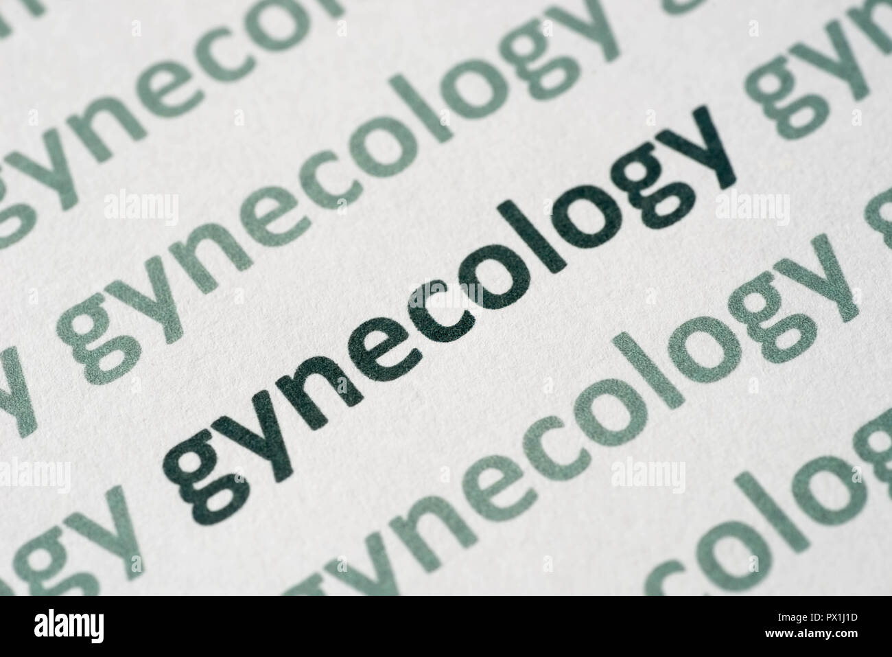 word gynecology printed on whte paper macro Stock Photo - Alamy
