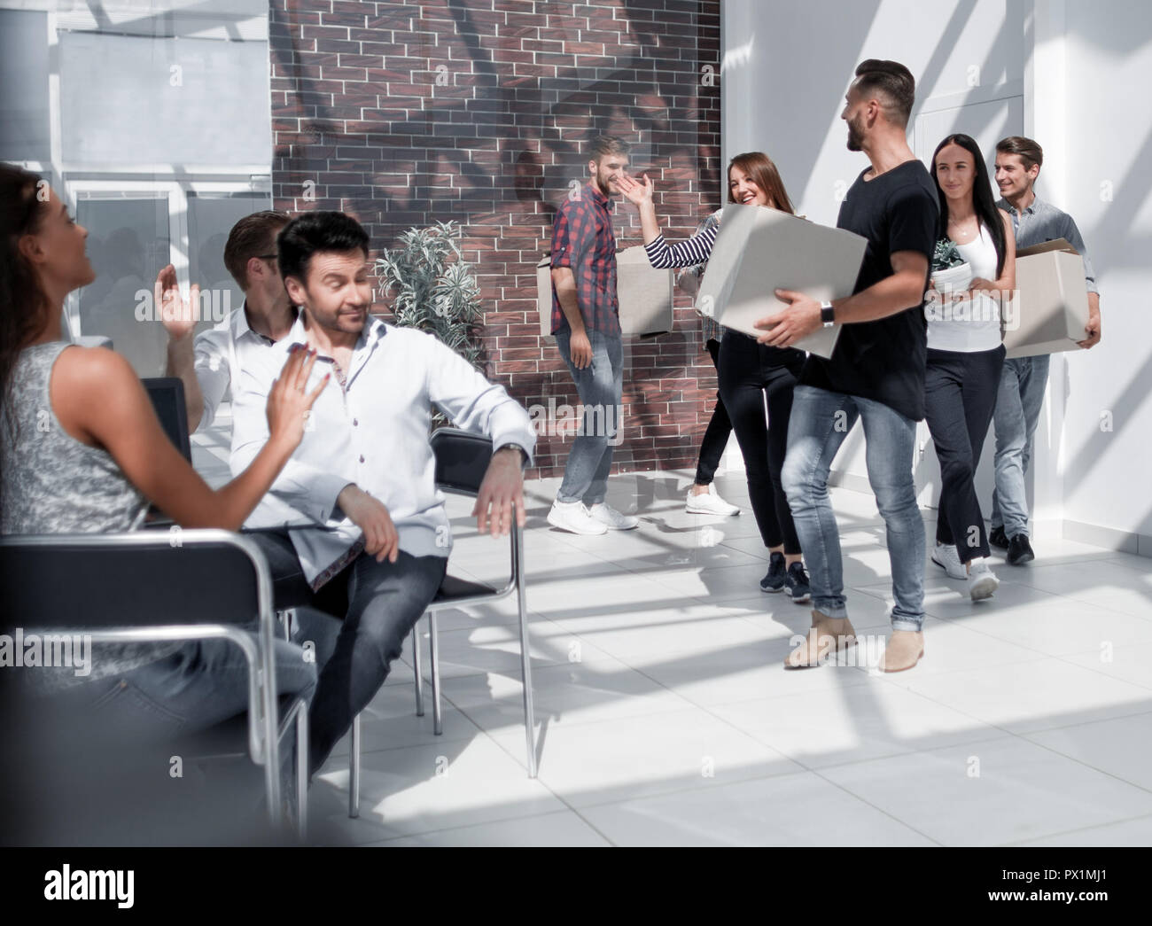 creative business team moves to a new office Stock Photo - Alamy