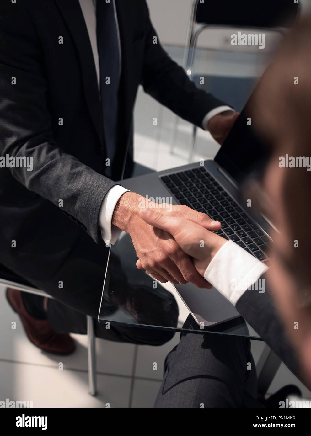 close up.handshake business people in the Bank office Stock Photo - Alamy