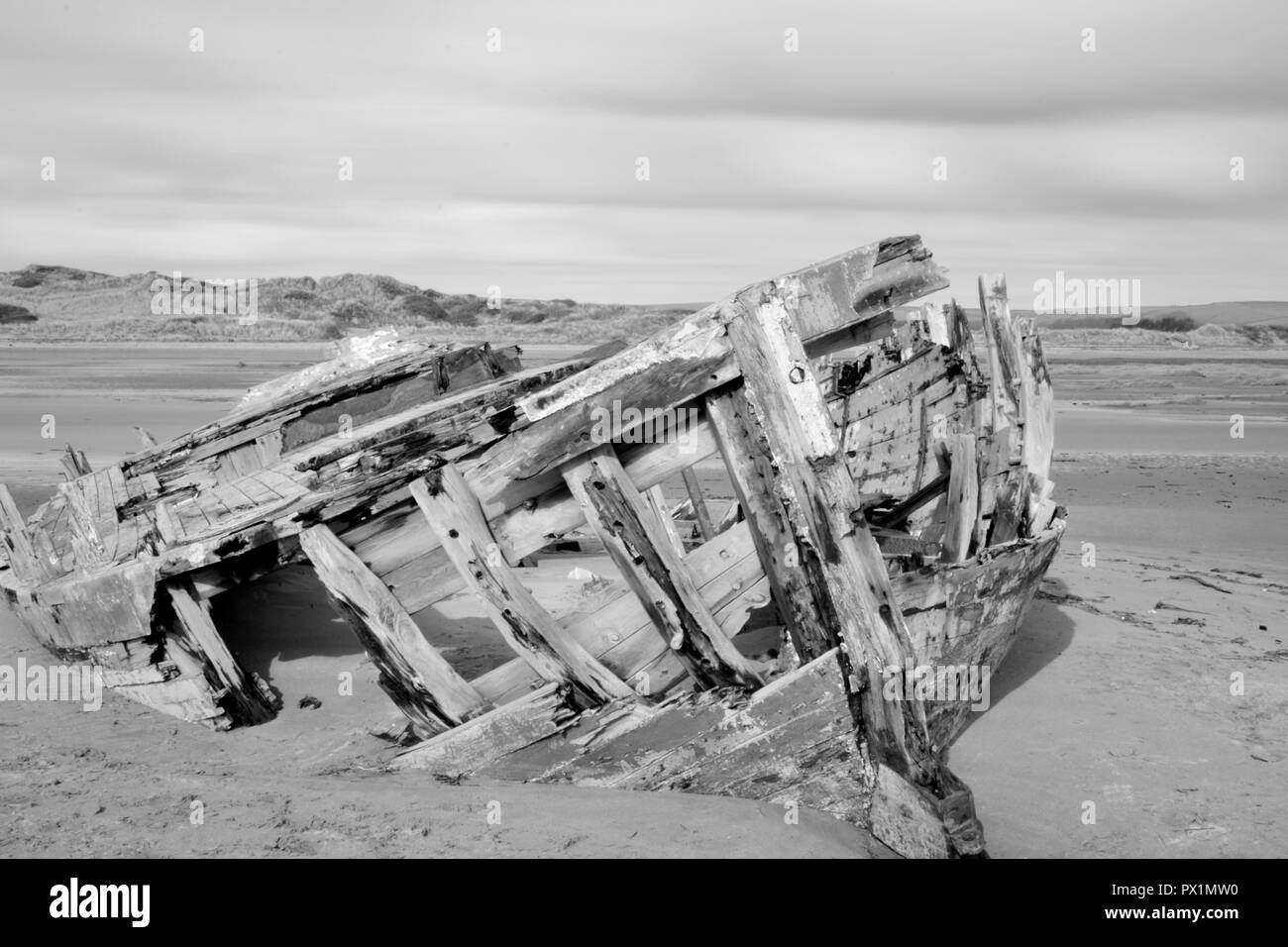 Black and white photo of the shipwreck at Crow point in Devon Stock ...