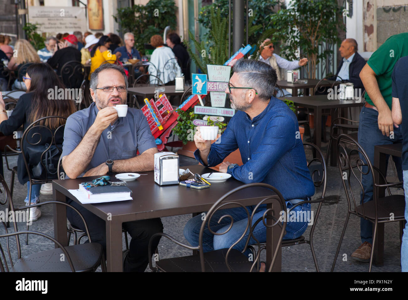 Men in street cafe hi-res stock photography and images - Alamy