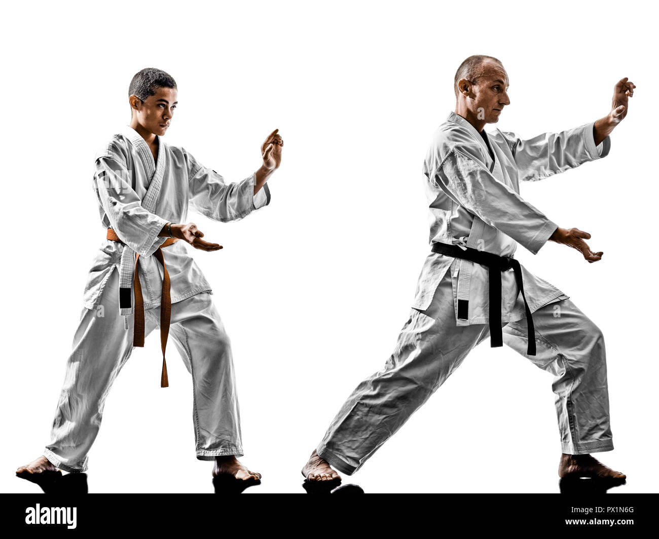 two karate men sensei and teenager student teacher teaching isolated on ...