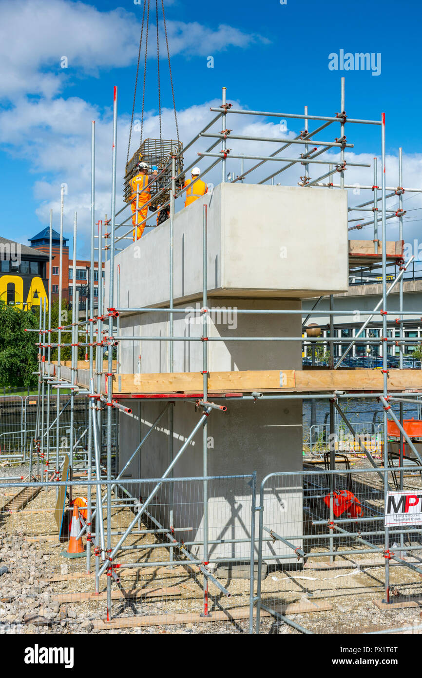 Rebar cage being lifted into position on a pillar for a new viaduct on ...