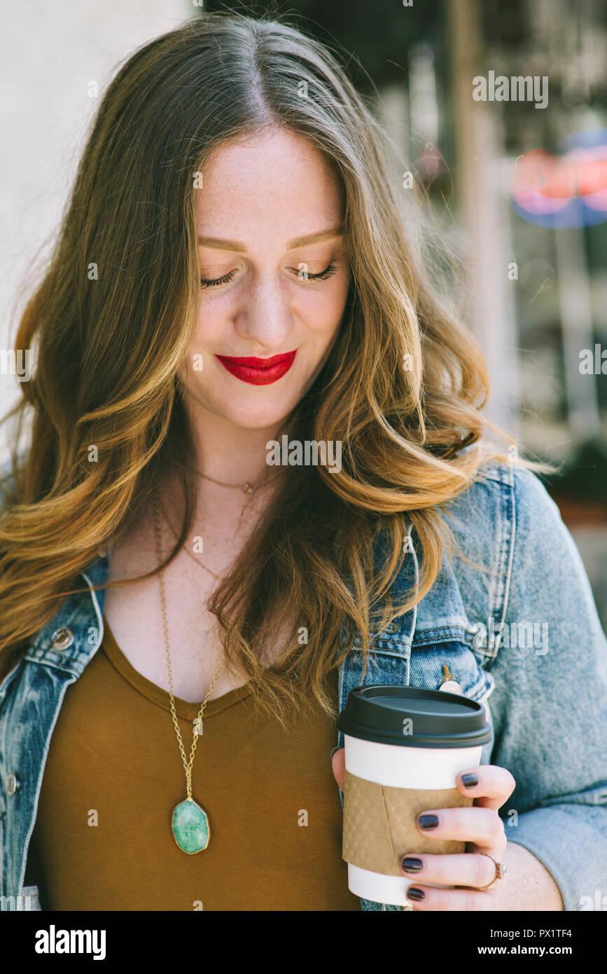 Hip millennial portrait while drinking coffee Stock Photo - Alamy