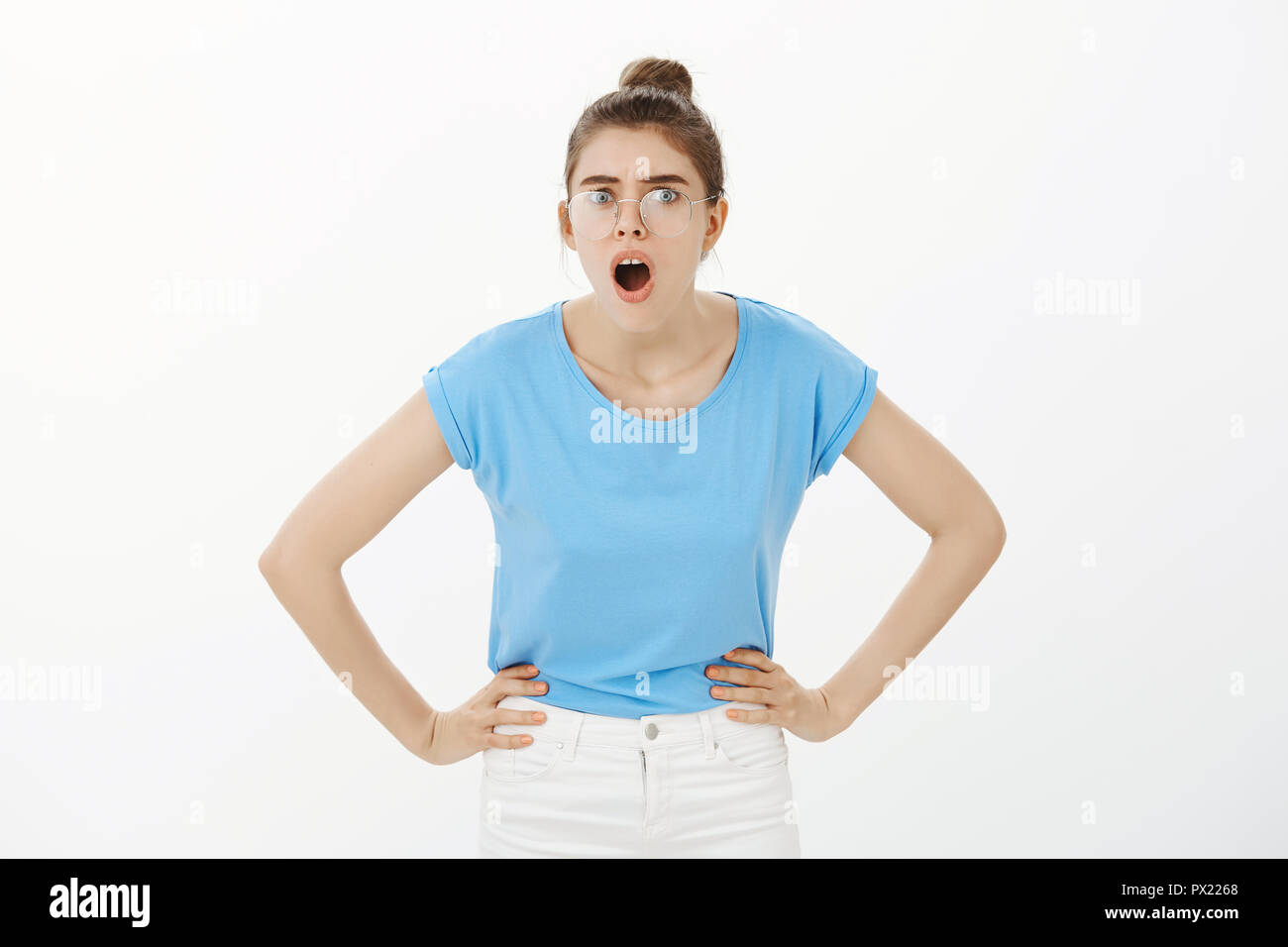 Girl arguing with younger brother. Portrait of displeased pissed ...