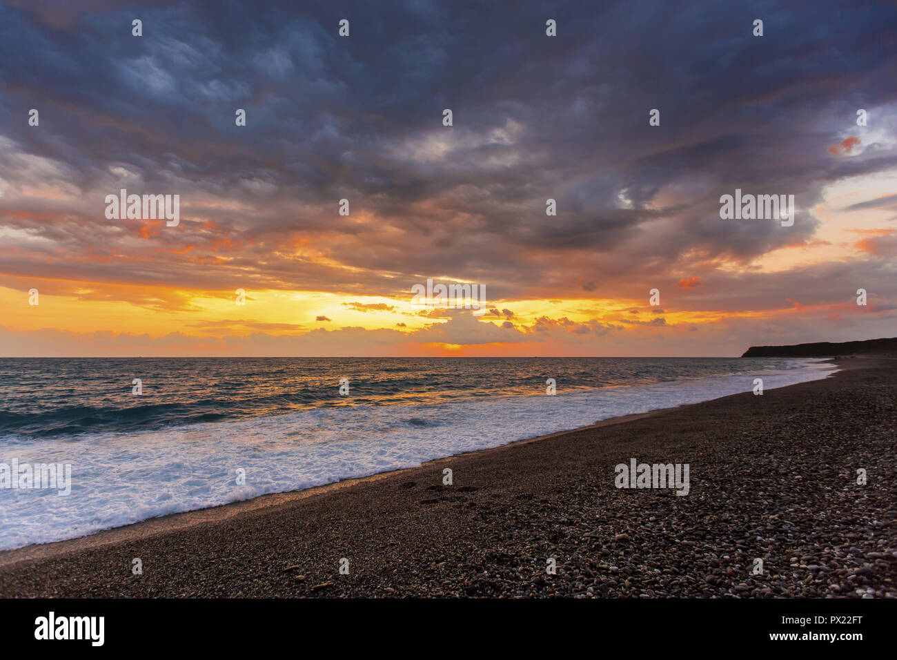 sunset on beach Stock Photo - Alamy