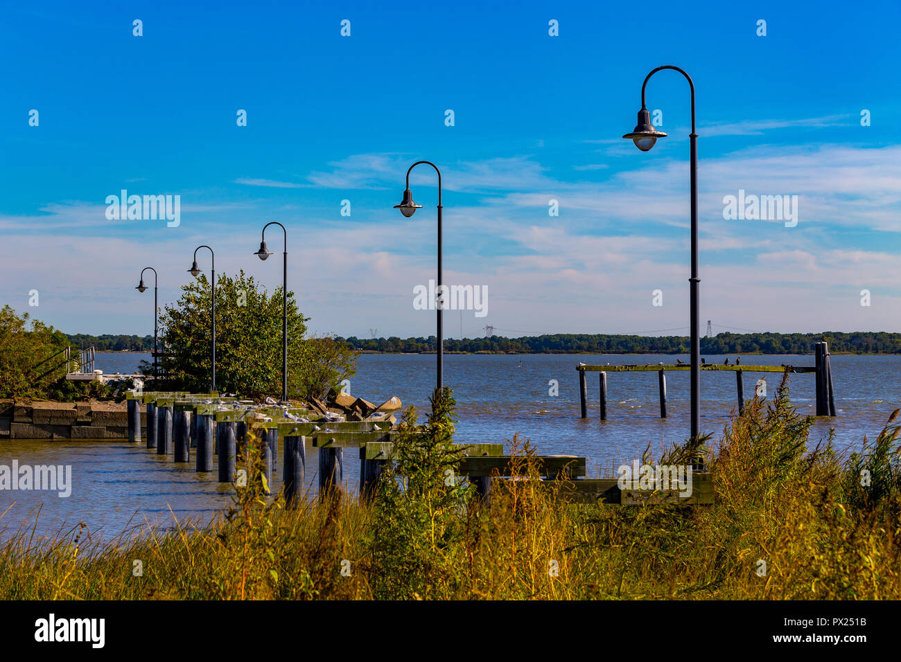 New Castle, DE, USA - September 23, 2015: Remains of a damaged dock and ...