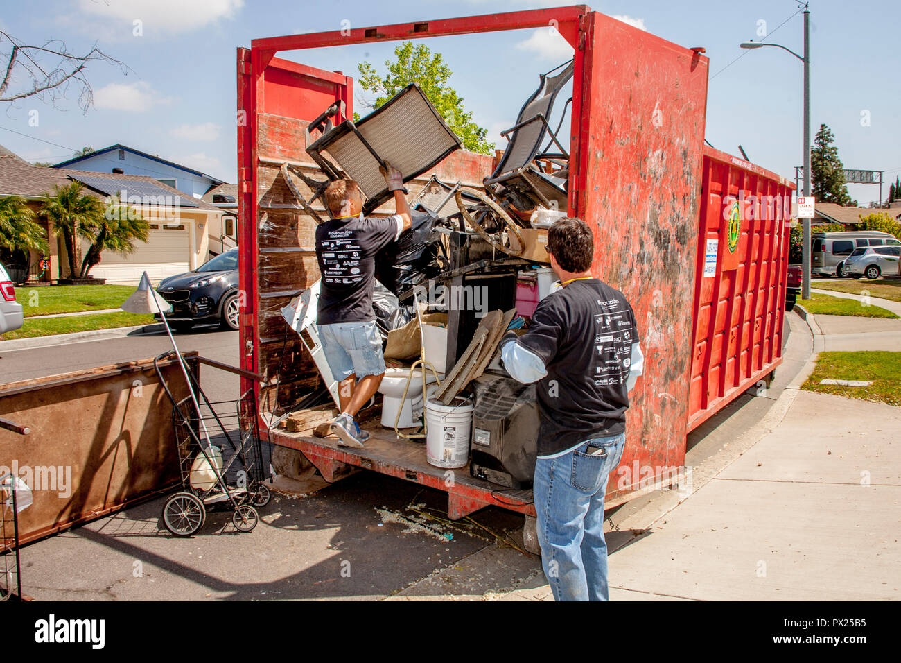 Person throwing trash sidewalk hi-res stock photography and images - Alamy