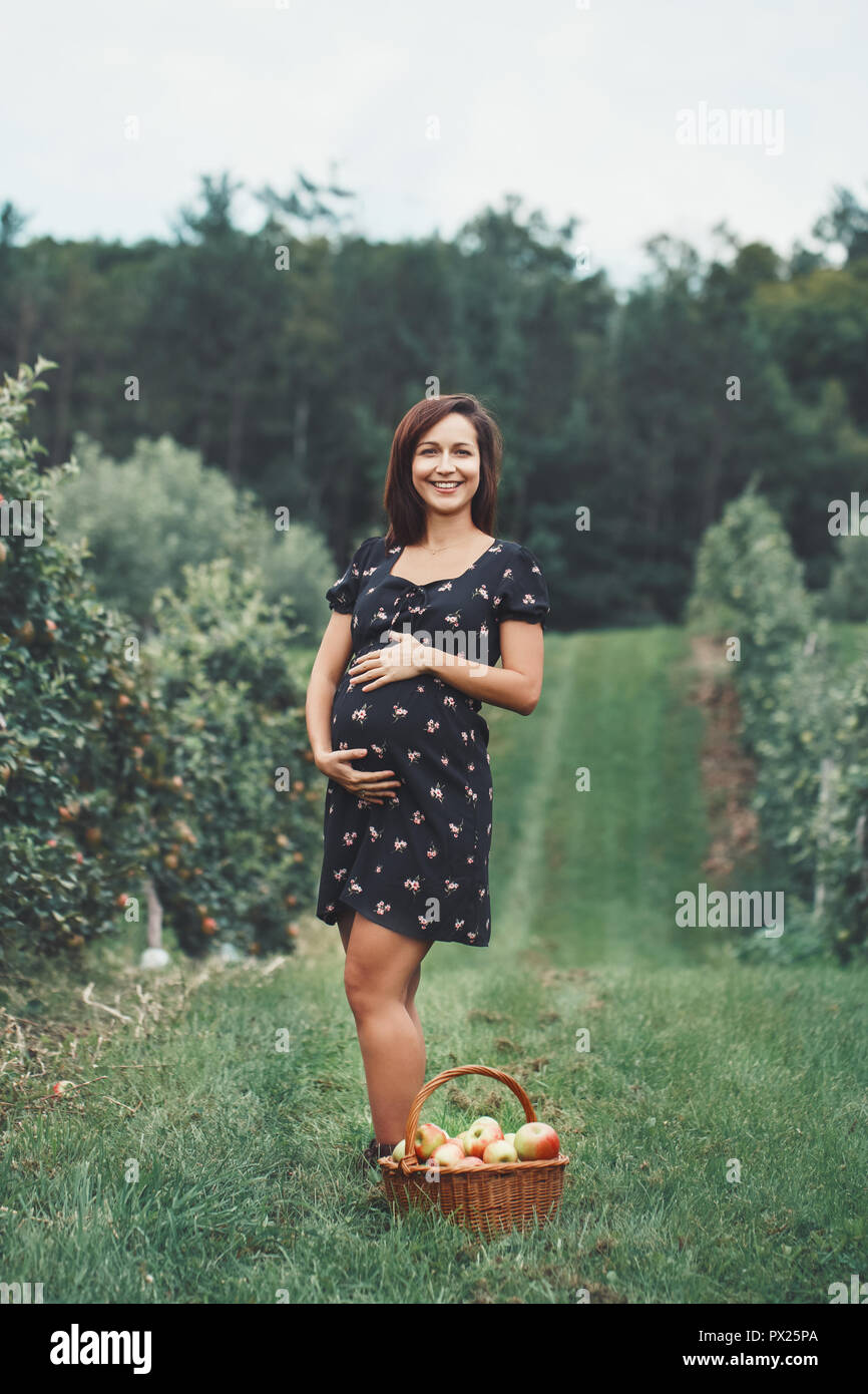 Happy healthy pregnancy. Portrait of pregnant young brunette Caucasian ...