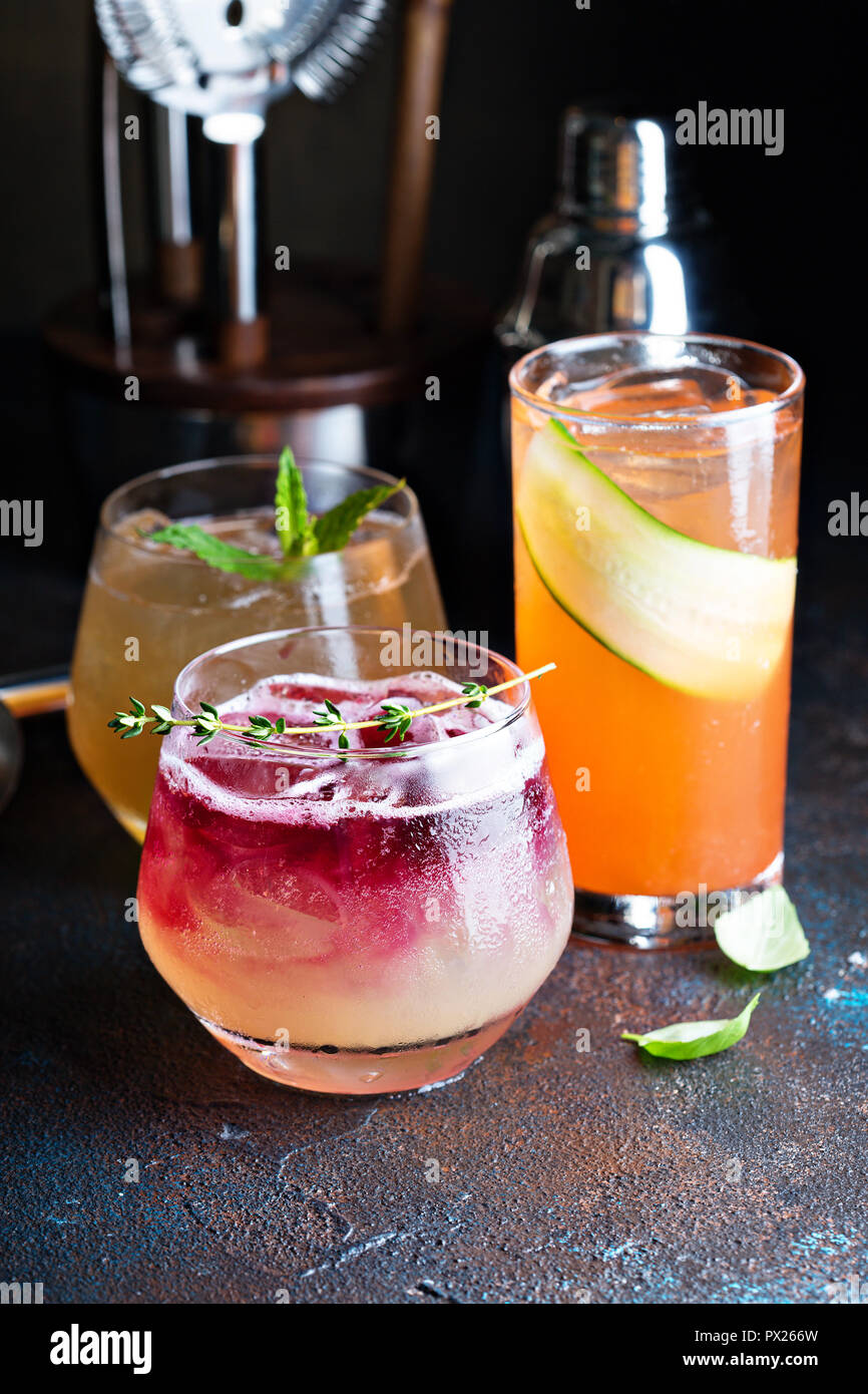 Variety of seasonal fall cocktails with citrus, apple cider ...
