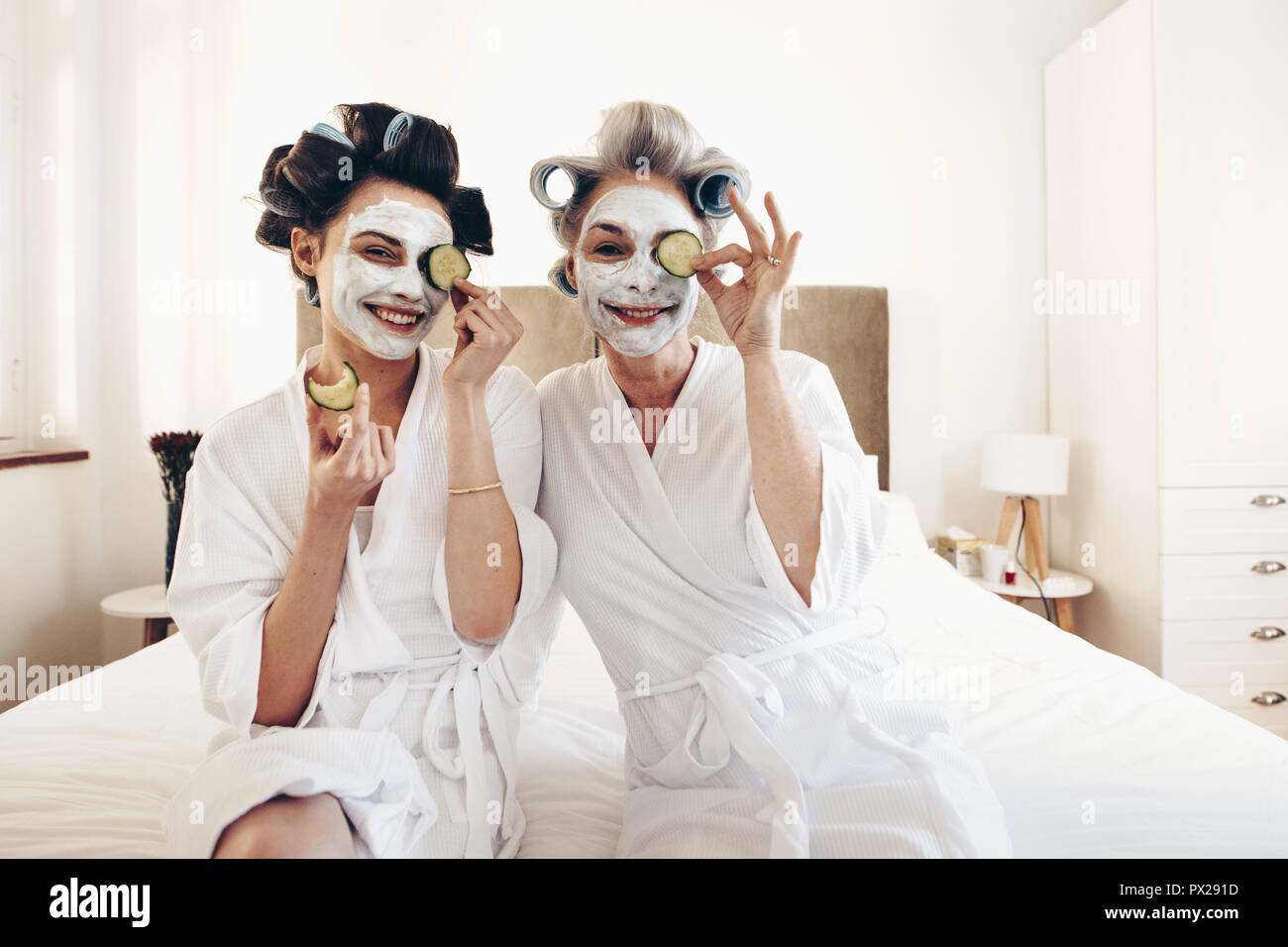 Mother daughter relaxing cucumber hi-res stock photography and images ...