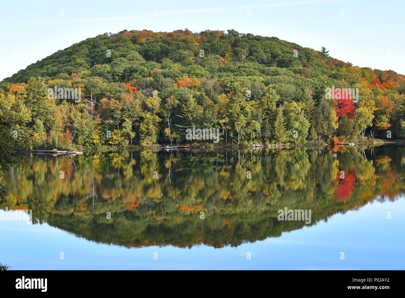 Fall scenery of a field with fence posts Stock Photo - Alamy