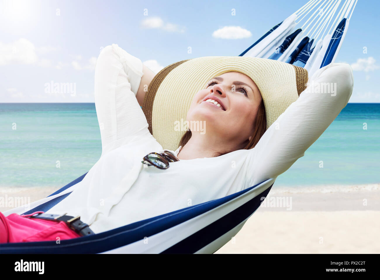 Woman hammock beach hi-res stock photography and images - Alamy