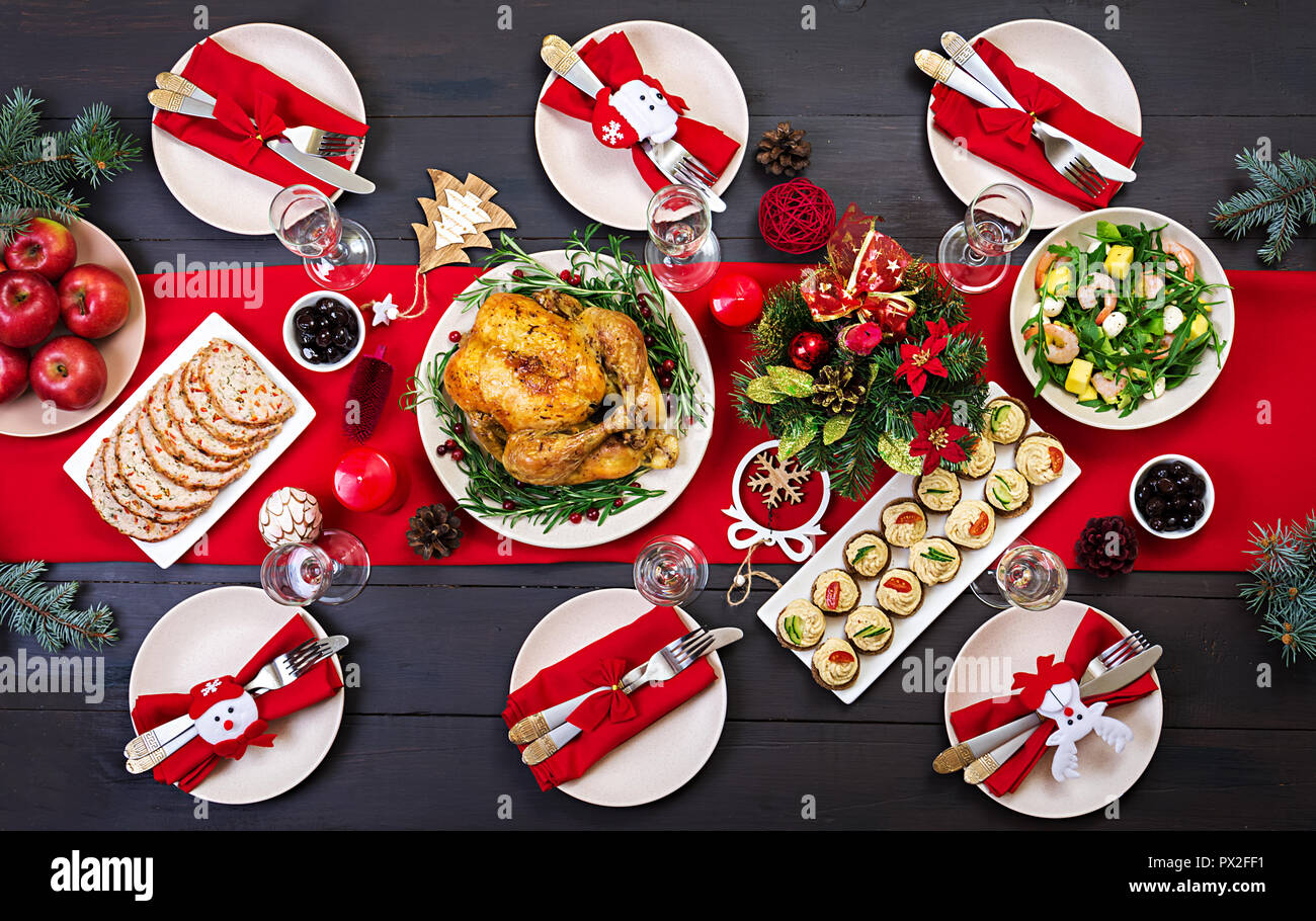 Baked turkey. Christmas dinner. The Christmas table is served with a ...