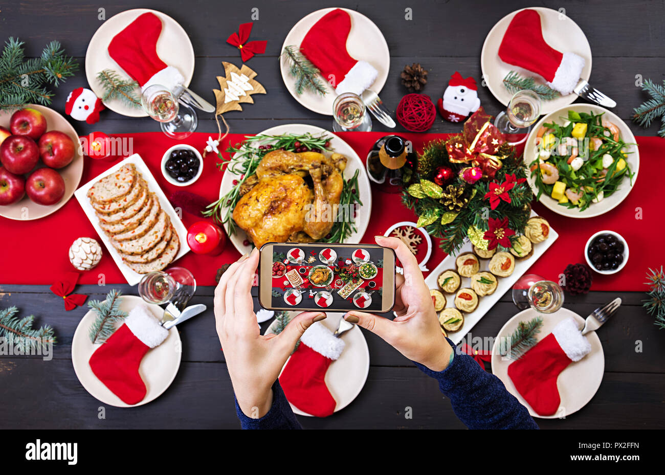 Baked turkey. Christmas dinner. The Christmas table is served with a ...