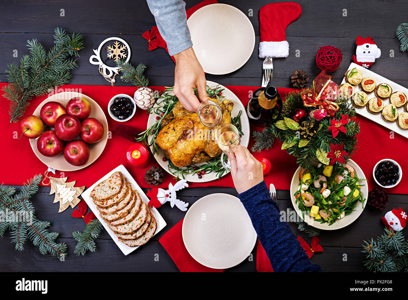 Baked turkey. Christmas dinner. The Christmas table is served with a ...