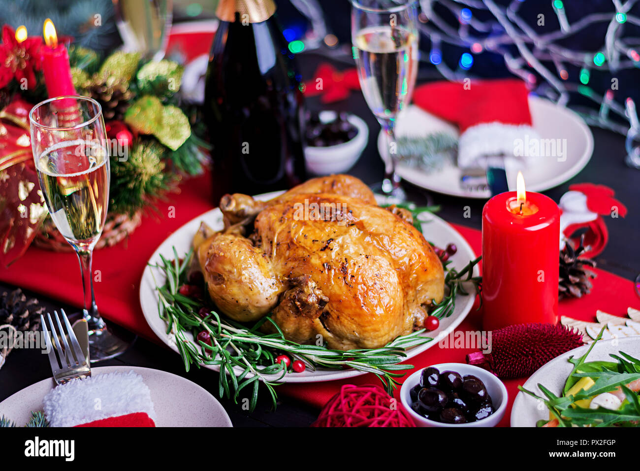 Baked turkey. Christmas dinner. The Christmas table is served with a ...