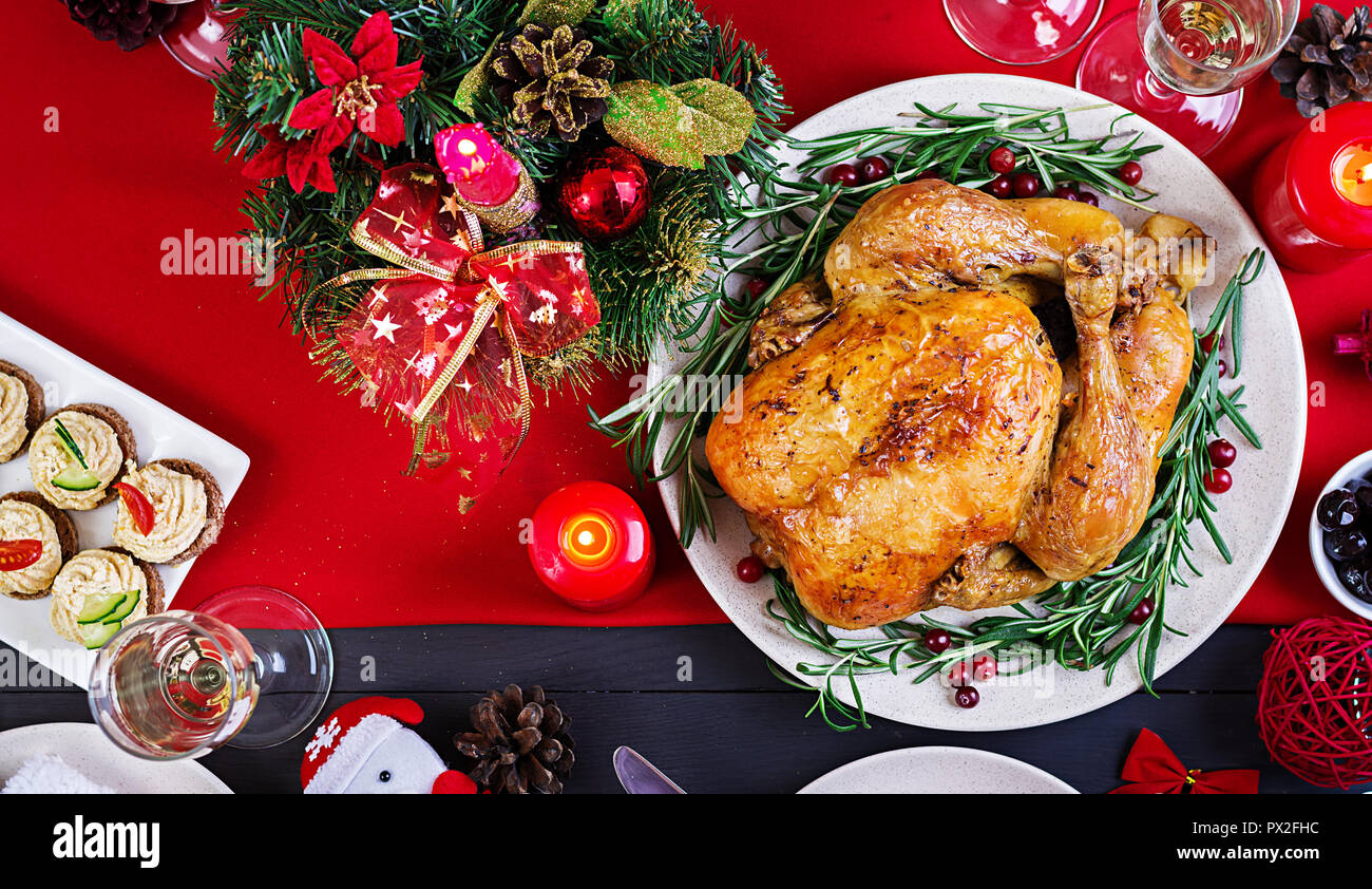 Baked turkey. Christmas dinner. The Christmas table is served with a ...