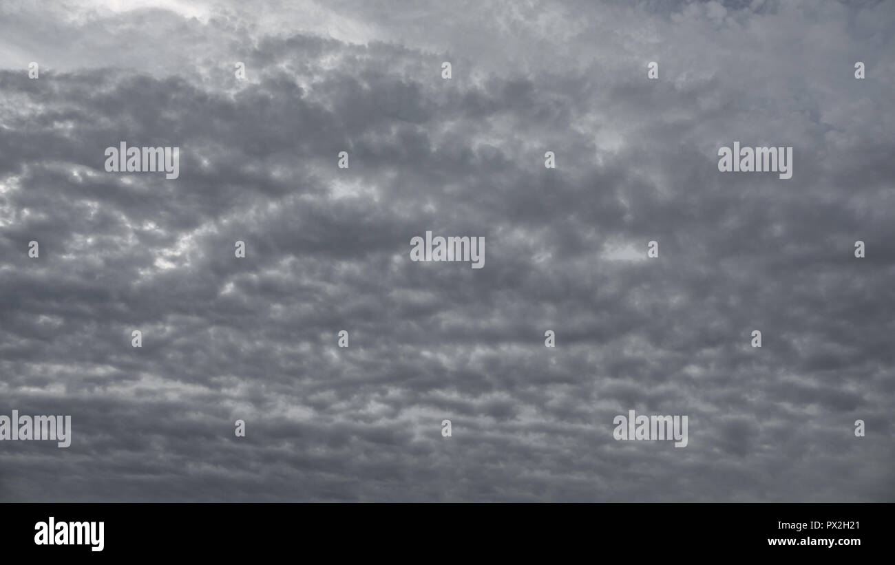 Background of gray cloudy sky bottom view, pattern Stock Photo - Alamy