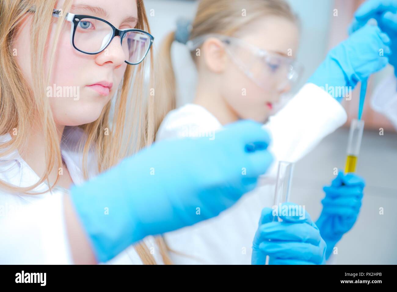 Chemistry Learn by Kids. Two Caucasian Girls with Laboratory Equipment ...