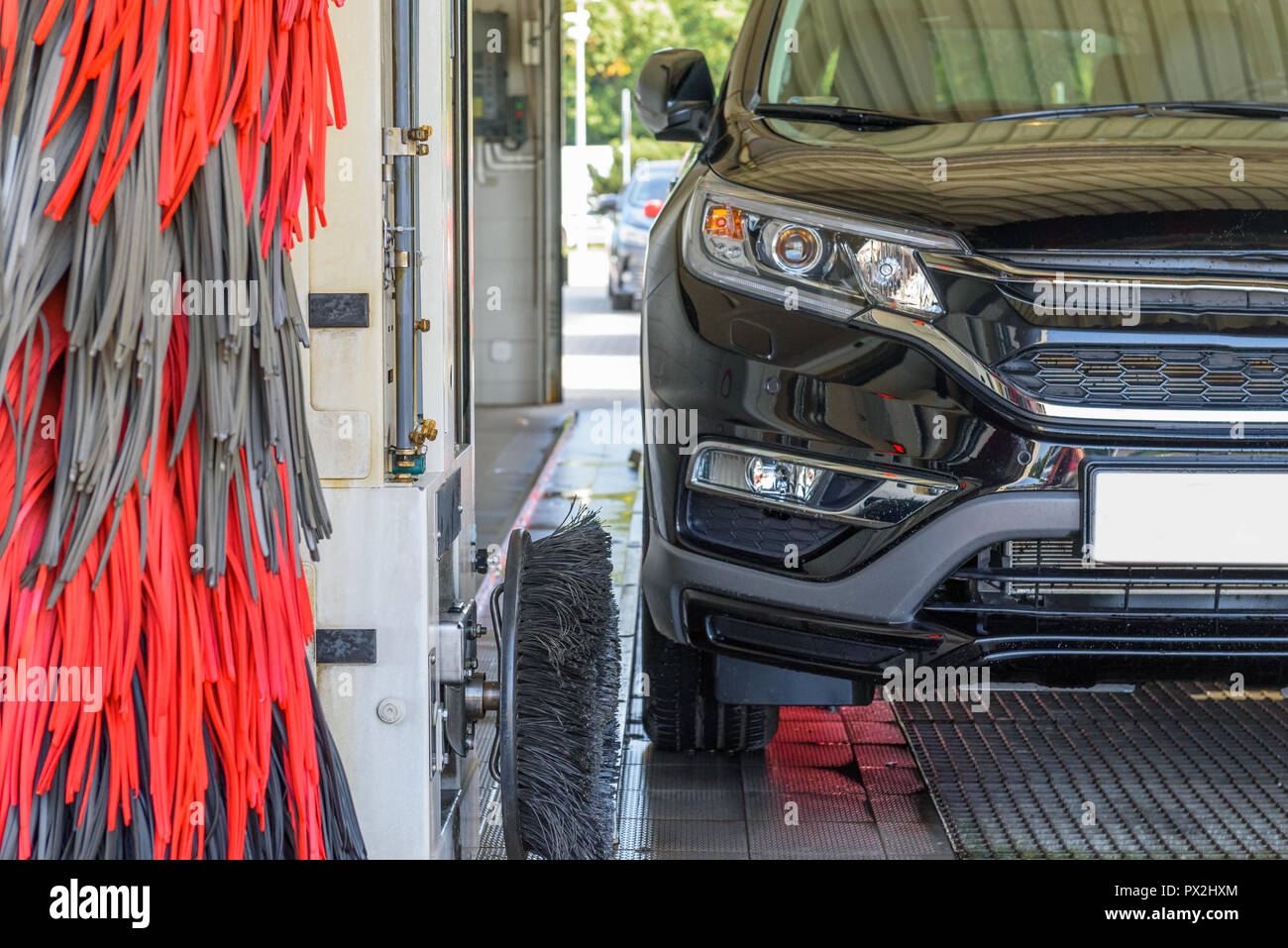Automatic brush car wash Stock Photo - Alamy