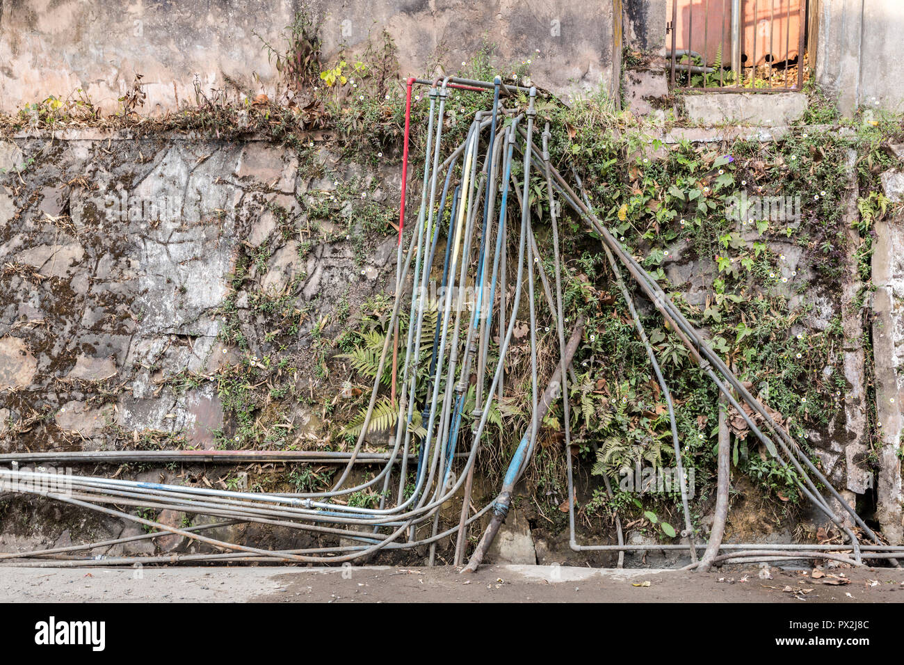 Water pipes in street, Shillong, Meghalaya, India Stock Photo - Alamy