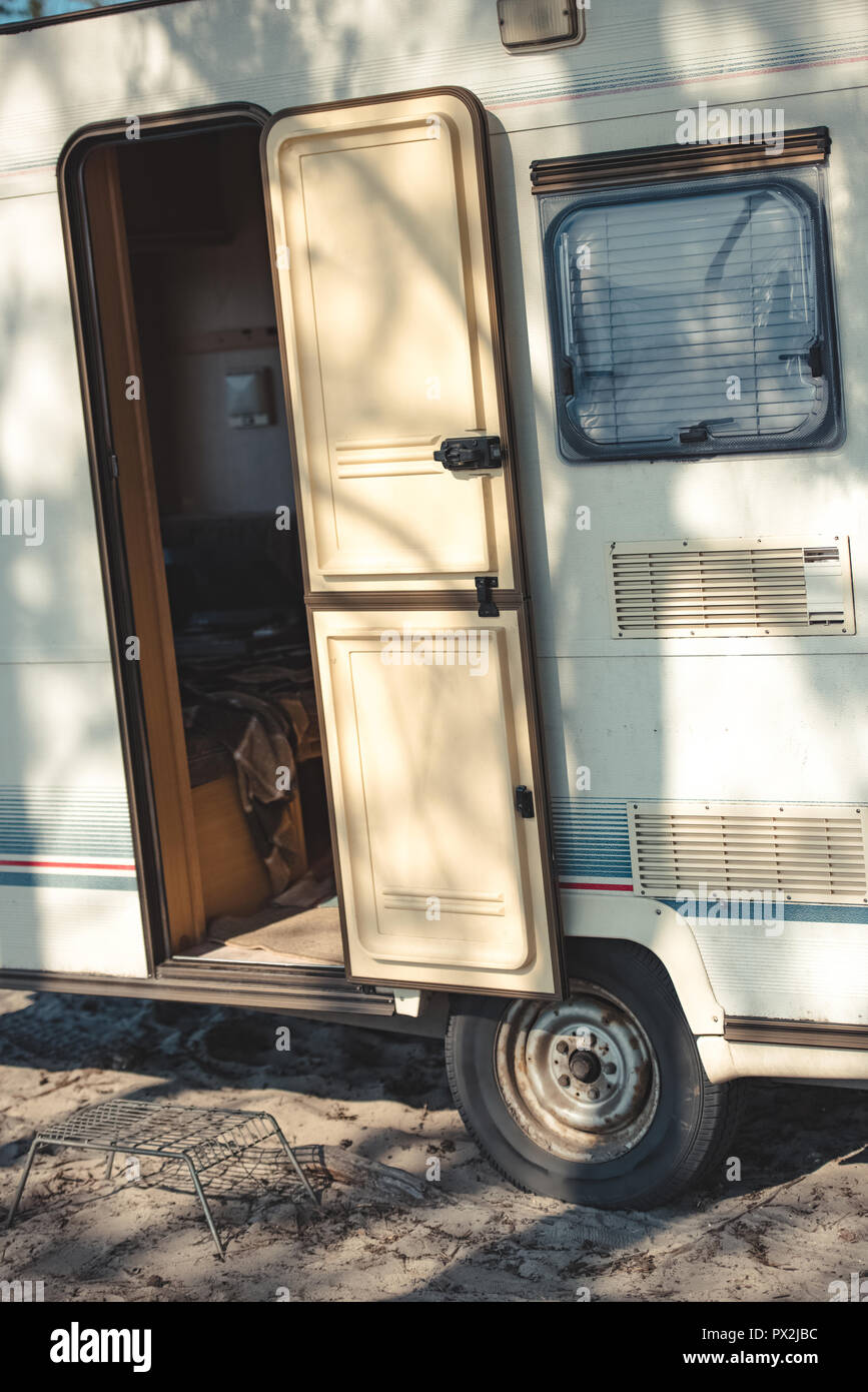 close up of travel trailer with open door in camp Stock Photo - Alamy