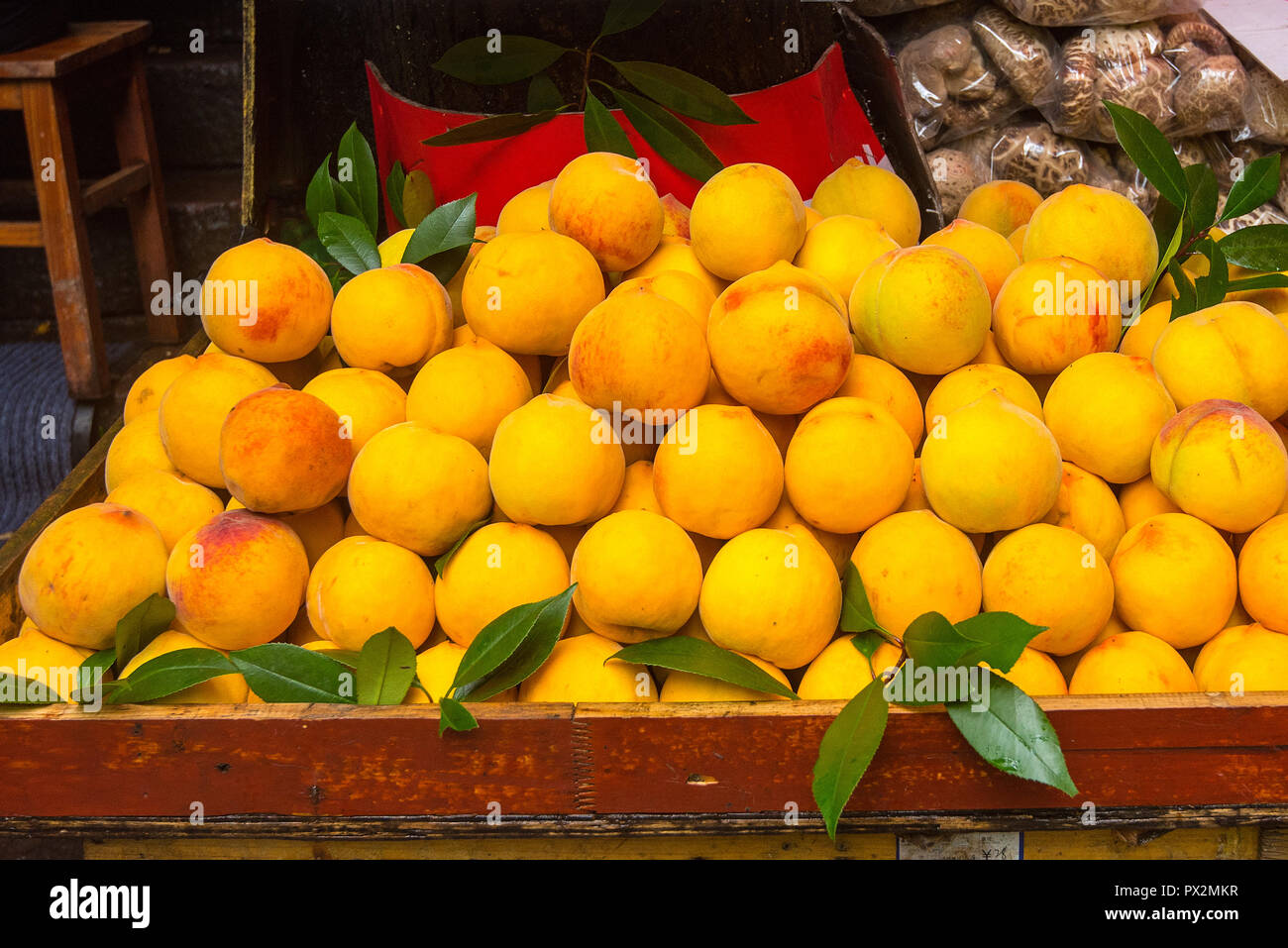 Peaches for sale in Zhangjiajie Nature Reserve, Hunan, China Stock ...