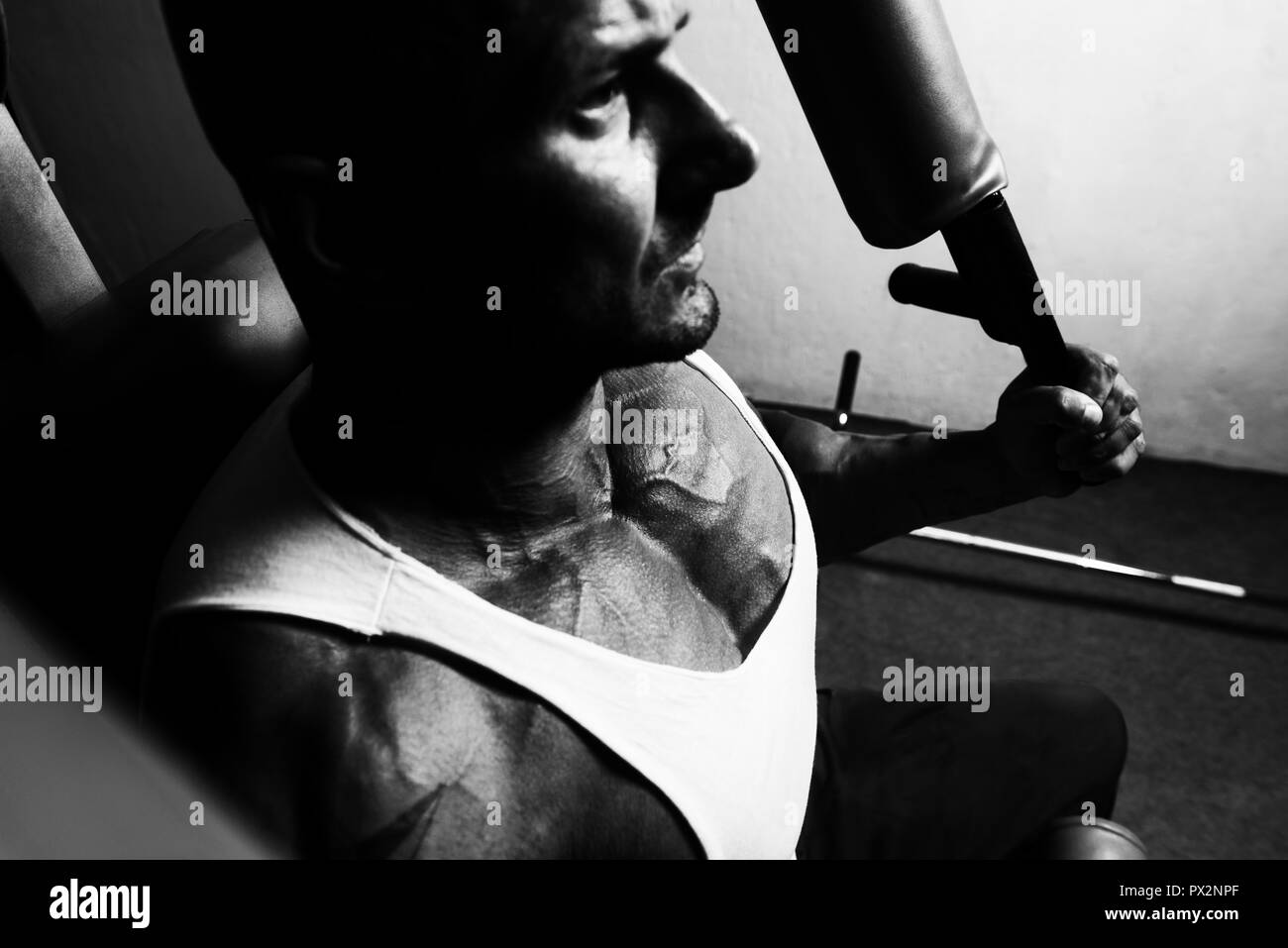 Handsome Muscular Fitness Bodybuilder Doing Heavy Weight Exercise For ...