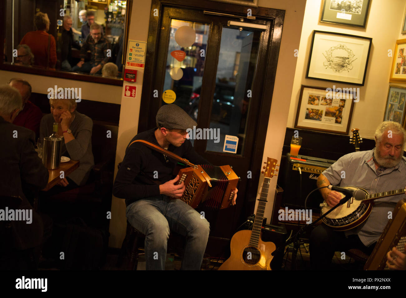Traditional Scottish folk music band in Port Charlotte Hotel bar, in ...