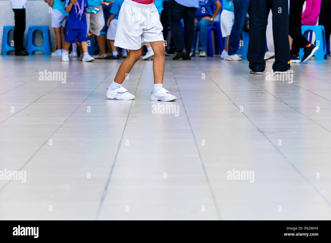 Color sports competition of elementary school children, practicing ...