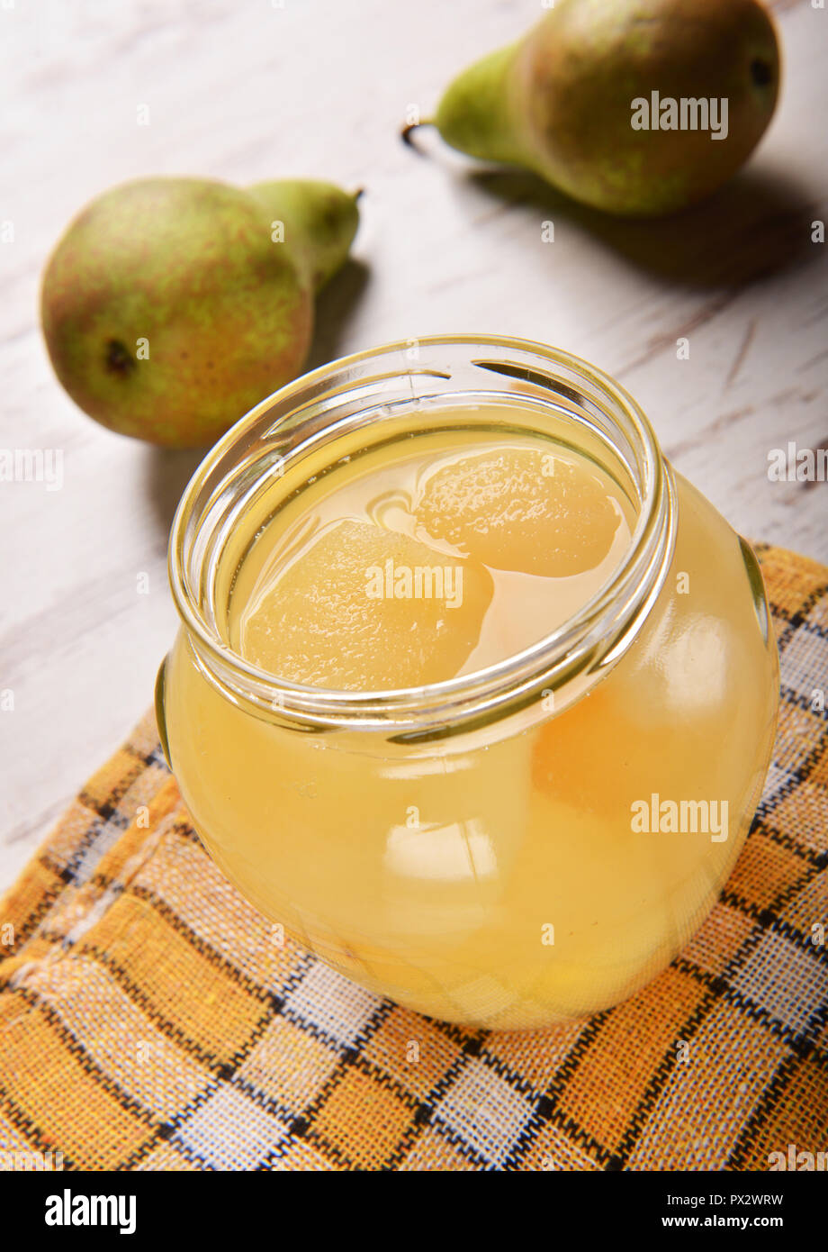 pears in light syrup Stock Photo - Alamy