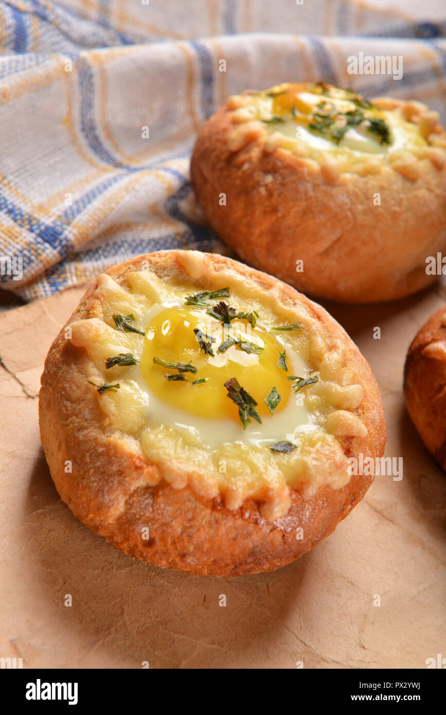 Roasted buns stuffed with eggs and bacon Stock Photo - Alamy