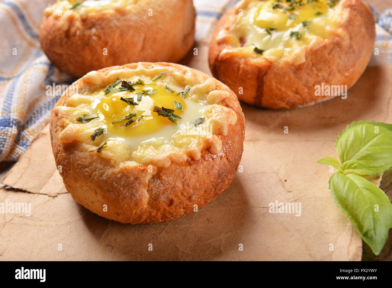 Roasted buns stuffed with eggs and bacon Stock Photo - Alamy