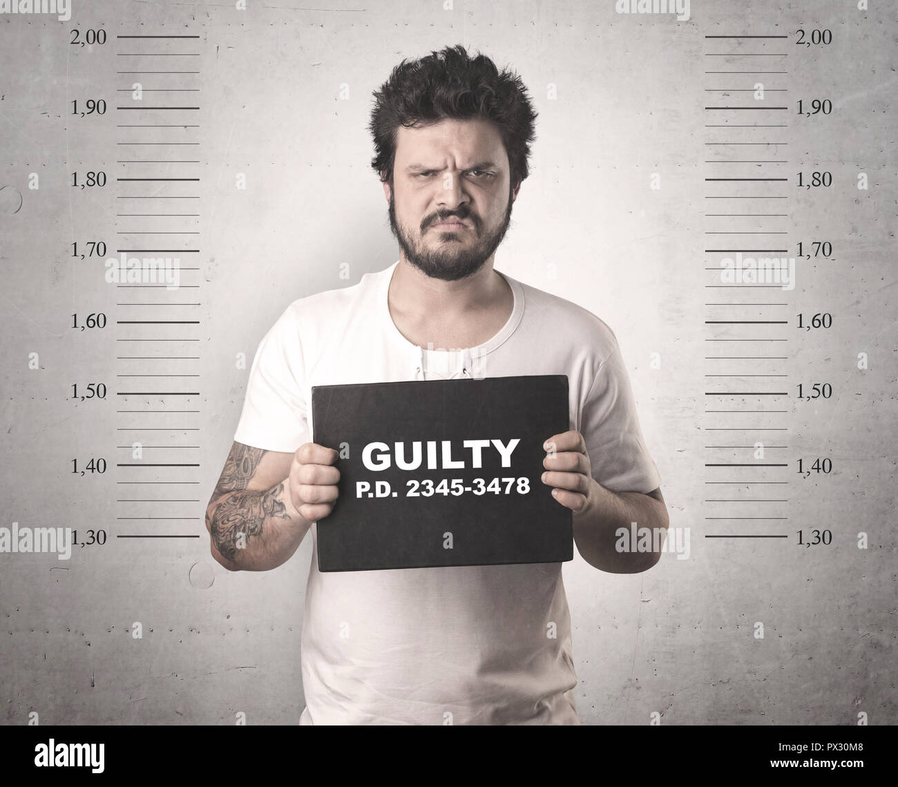 Caught guilty man with ID signs on his hand Stock Photo - Alamy