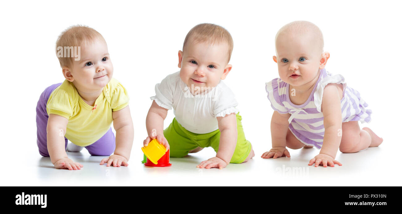cute smiling babies girls weared clothes crawling isolated on white ...