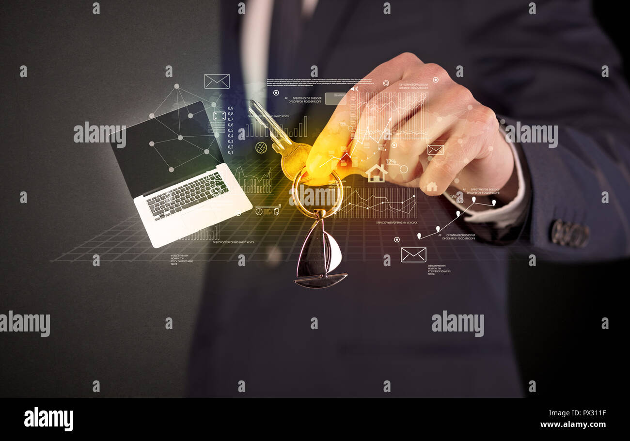 Businessman in suit holding keys with statistics, graphs and icons ...