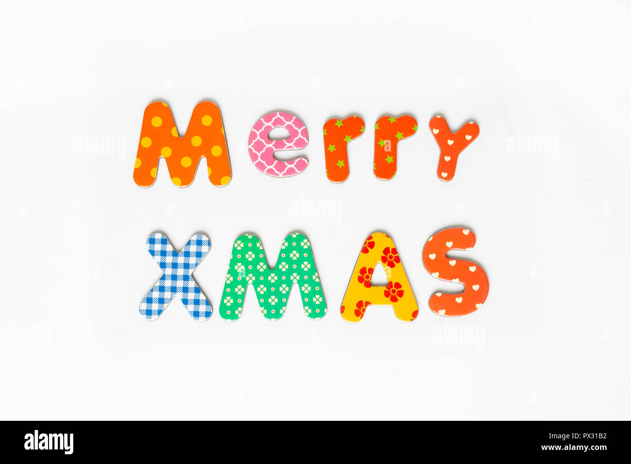Merry christmass inscription made of colorful letters Stock Photo - Alamy