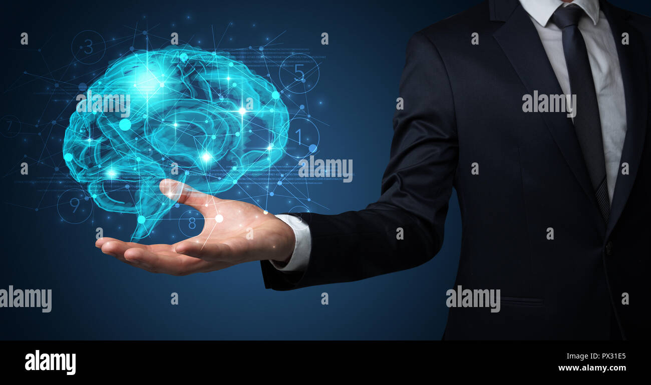 Businessman holding human brain on his hand with logistics symbols ...