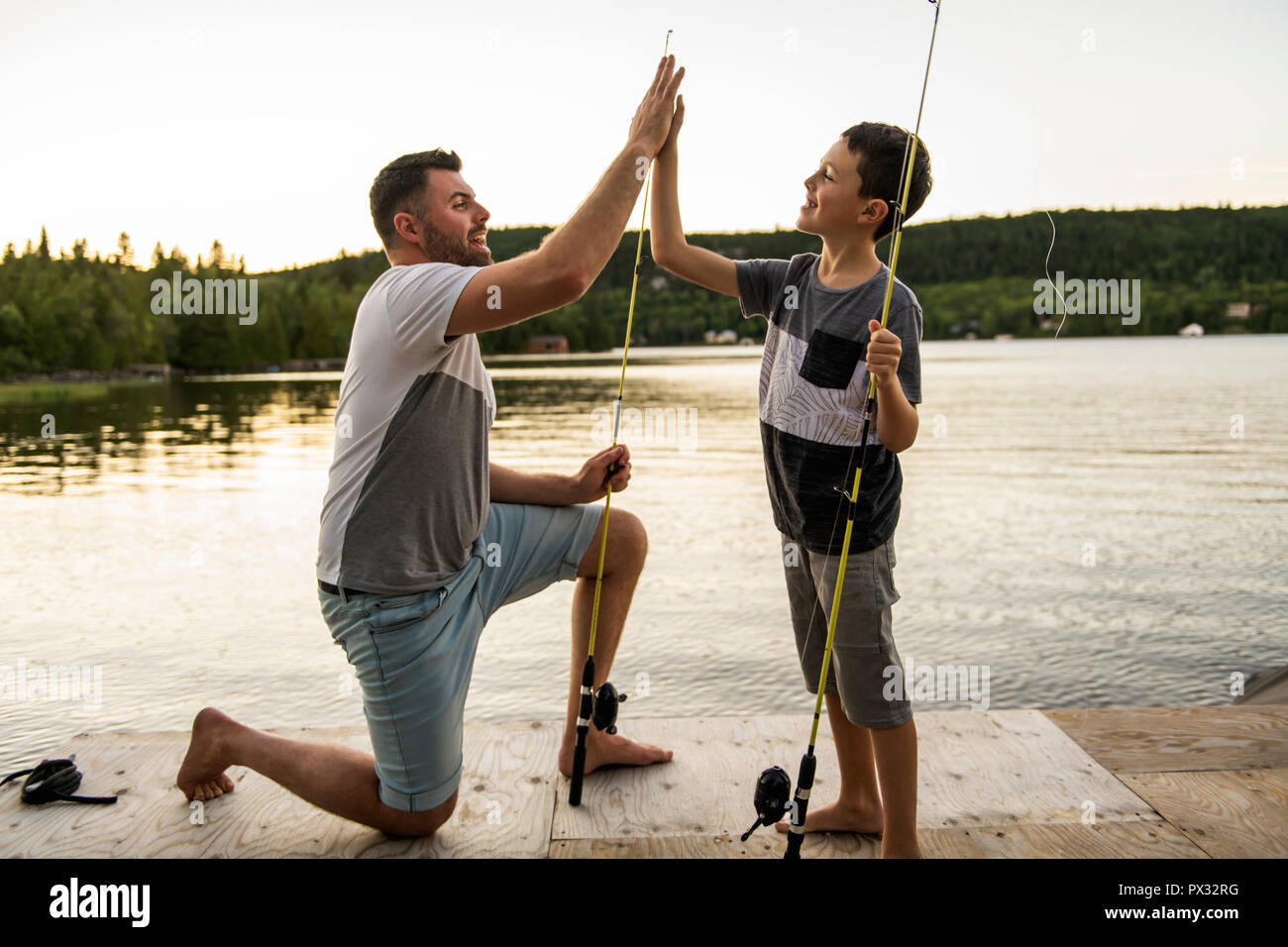 Fishing dad and son fish hi-res stock photography and images - Alamy