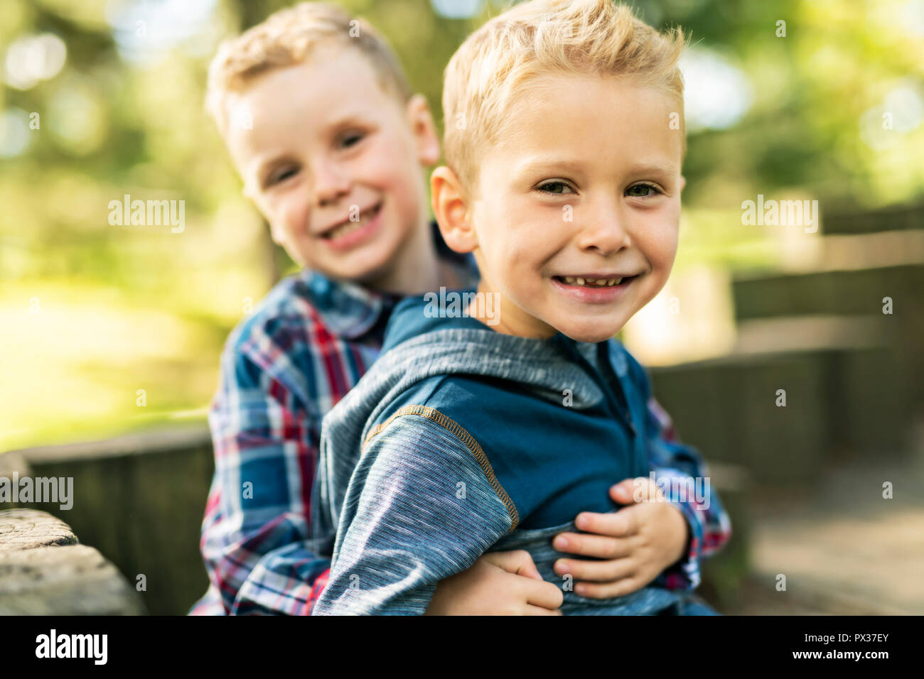 The Two cute brothers in casual clothes Stock Photo - Alamy