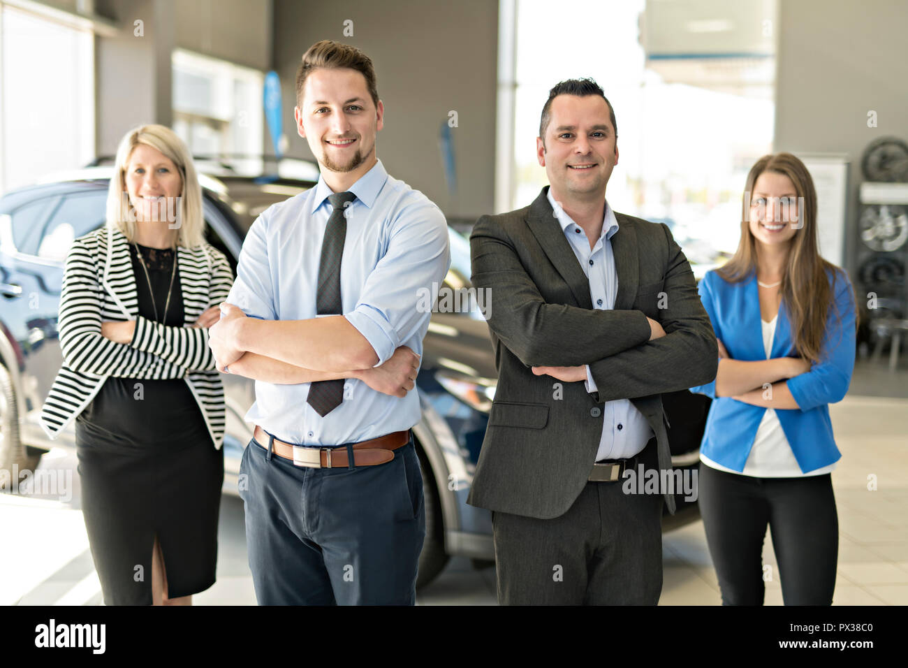 Business team car seller on the car room Stock Photo - Alamy