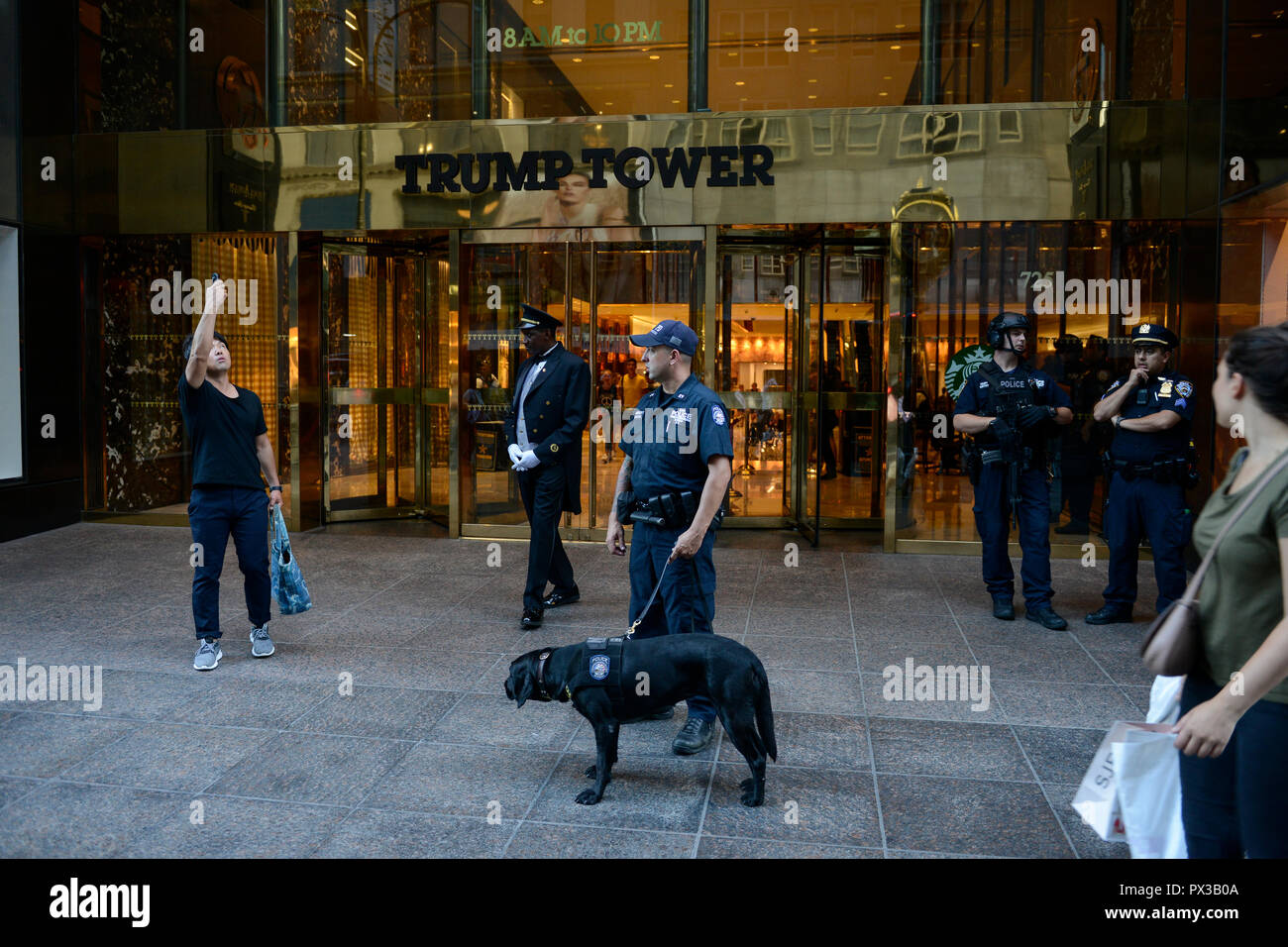 USA, New York City, Trump Tower with white police security and black ...