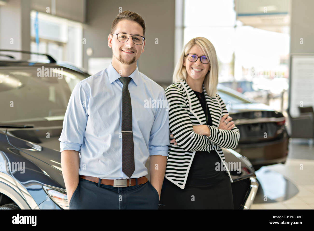 Business team car seller on the car room Stock Photo - Alamy
