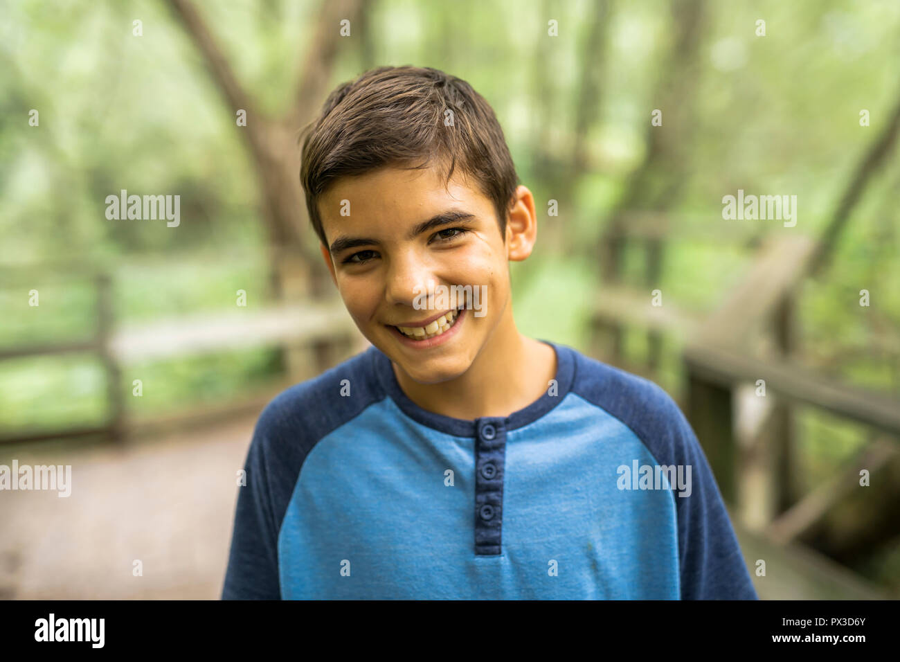 Portrait of a boy outdoors in the forest Stock Photo - Alamy